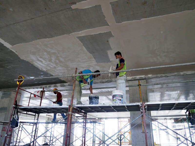 Construction Site Workers are Doing Ceiling Soffit Skim Coat Work at ...