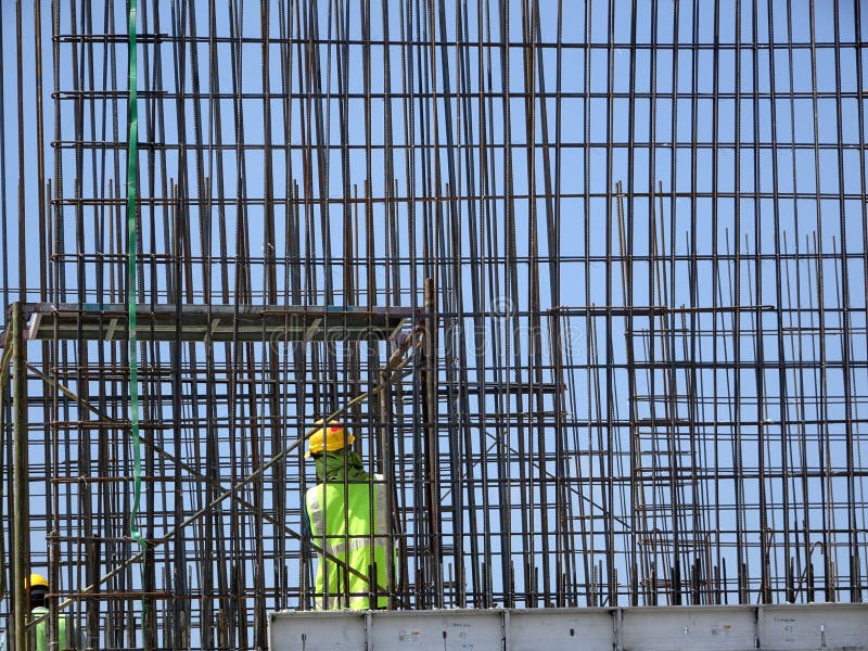Construction Workers Install Reinforcement Bars at the Construction ...