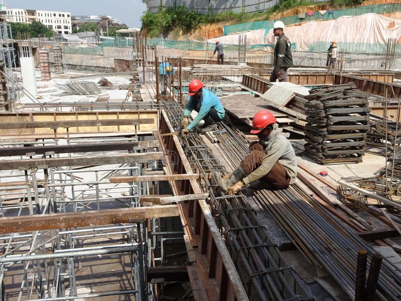 Construction Workers Install Reinforcement Bars at the Construction ...