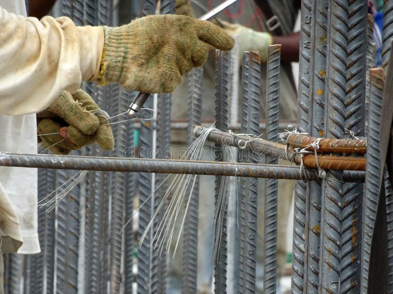 Construction Workers Install Reinforcement Bars at the Construction ...