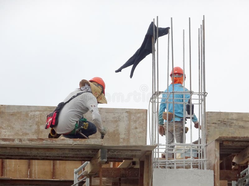 Construction Workers at the Construction Site Doing the daily Routine ...