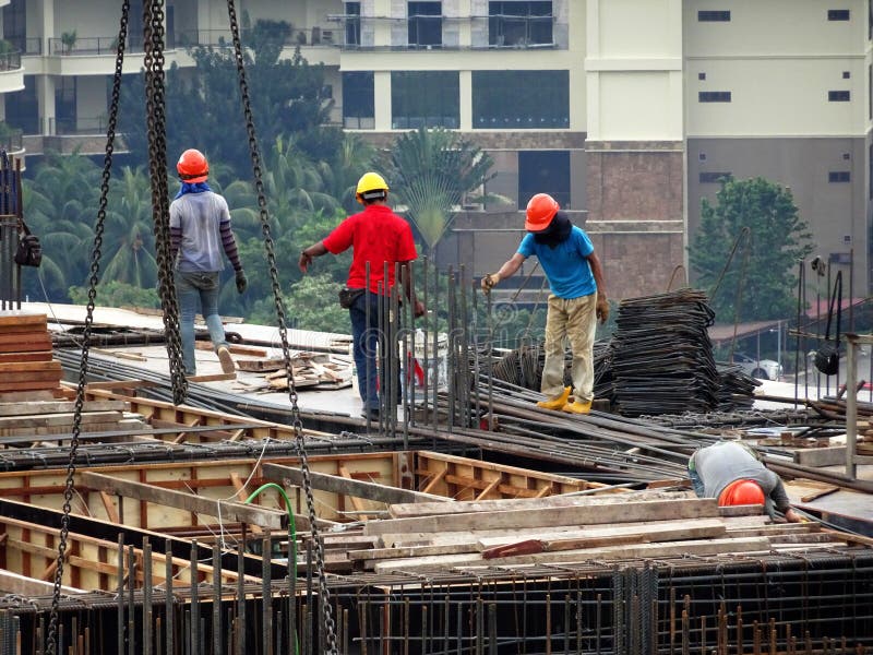 Construction Workers at the Construction Site Doing the daily Routine ...