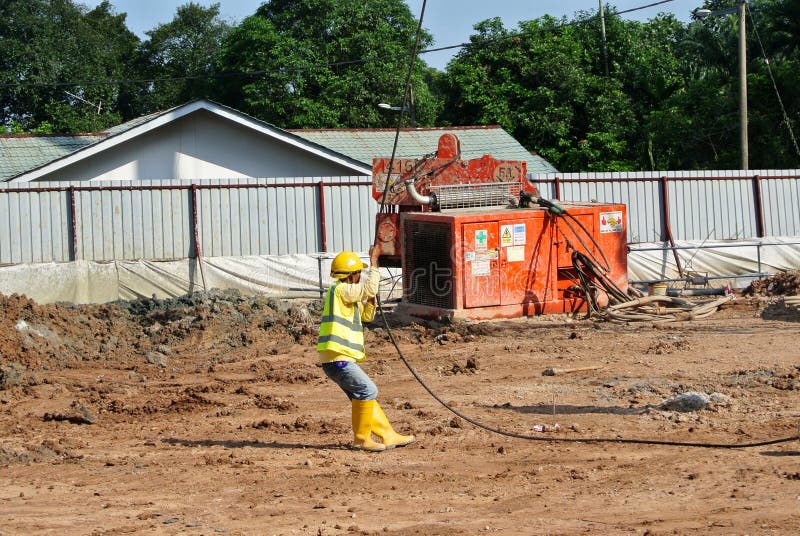 Construction Workers at the Construction Site Doing the daily Routine ...