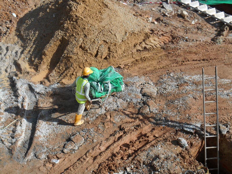 Construction Workers at the Construction Site Doing the daily Routine ...
