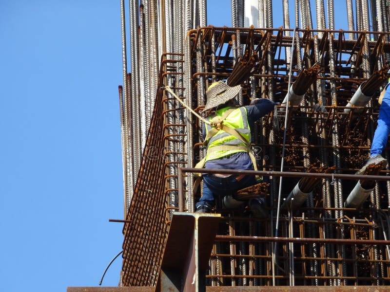 Construction Workers Working at Height at the Construction Site ...
