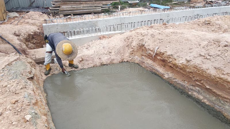 Construction Workers Hand Float Leveling Wet Concrete Has Been Poured ...