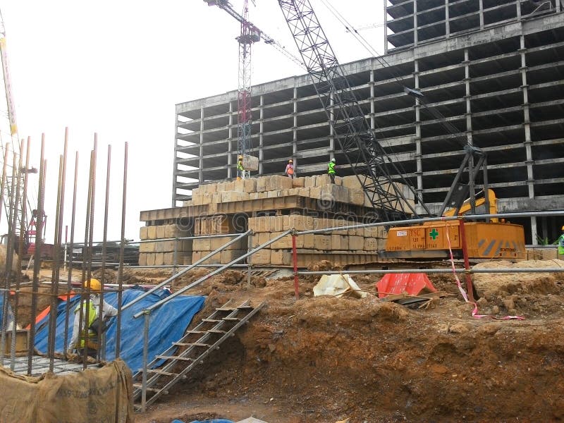 Construction Workers Stacking the Maintain Load Test Block at the ...
