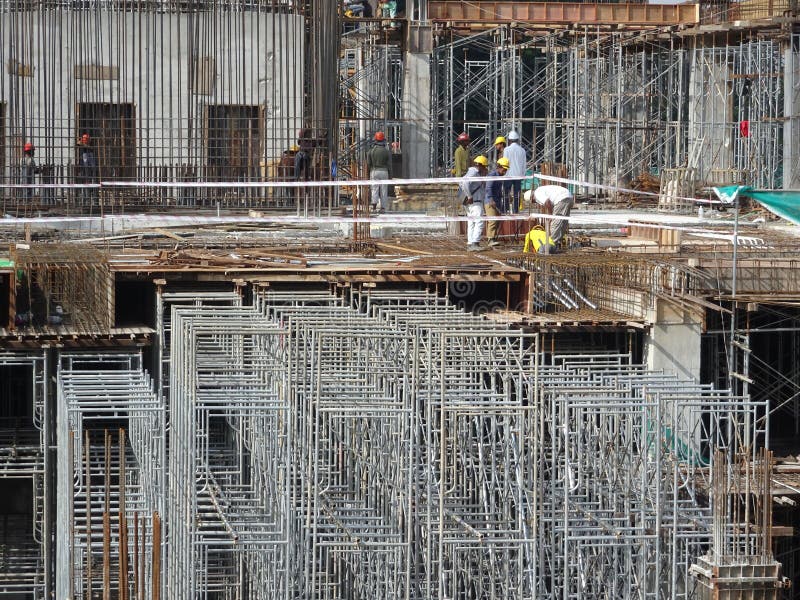 Construction Workers Working at Height at the Construction Site ...