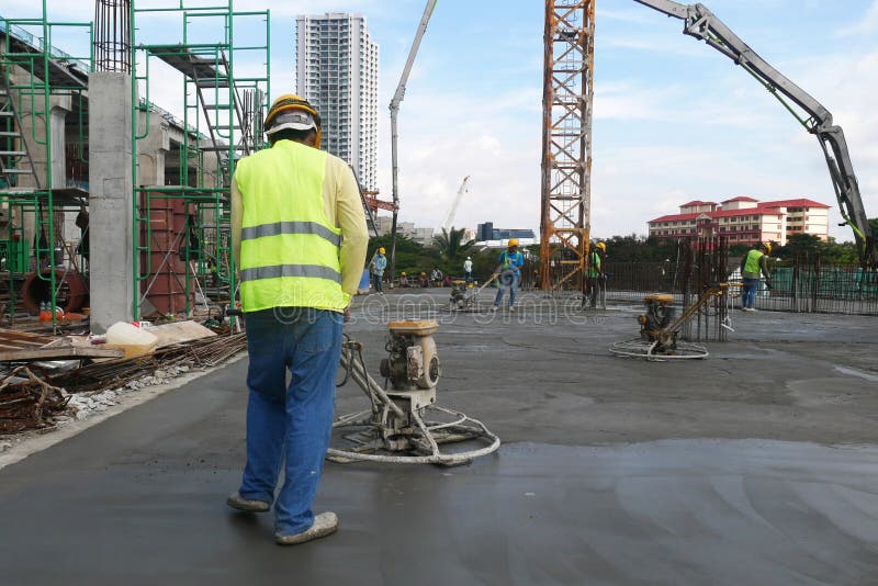 Power Float Works by Construction Workers at the Construction Site ...