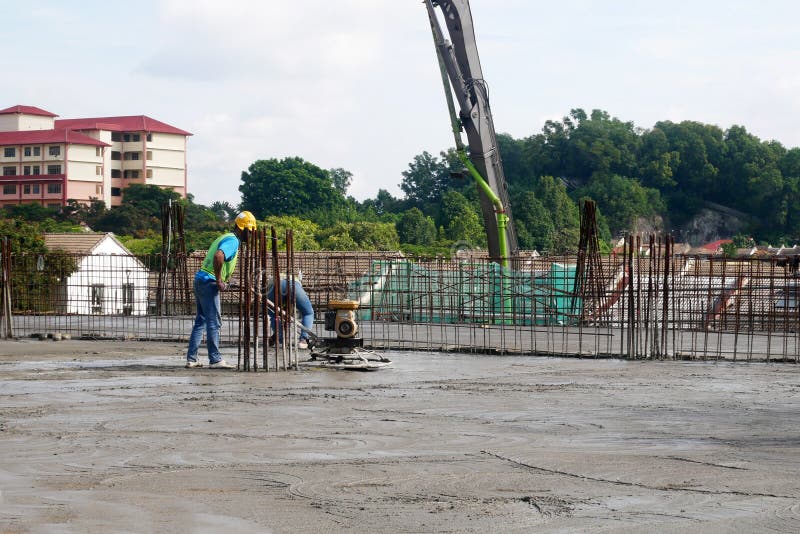 Power Float Works by Construction Workers at the Construction Site ...
