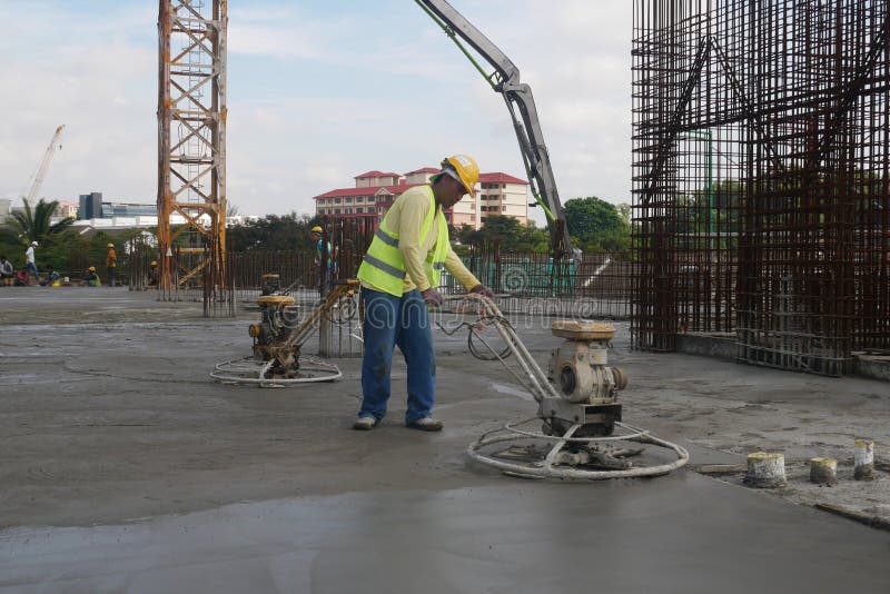 Power Float Works by Construction Workers at the Construction Site ...