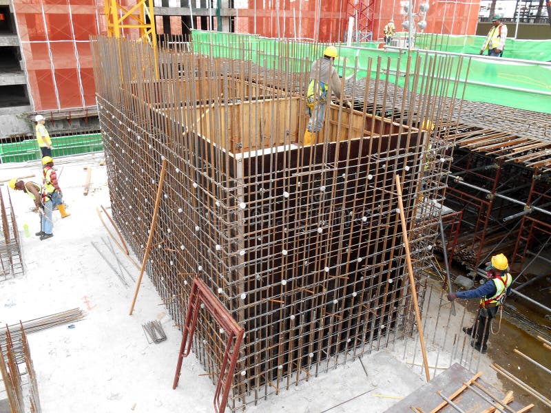 Construction Workers Installing Reinforcement Bar at the Construction ...
