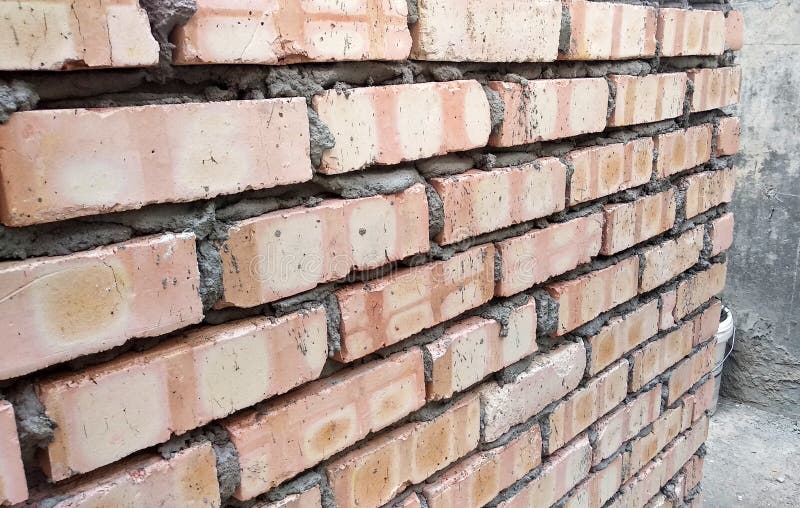 Brickwork by Construction Workers at the Construction Site. Stock Image ...