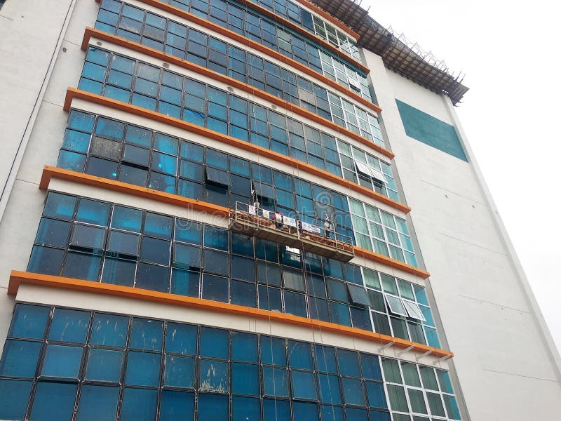 Workers are in the Process of Cleaning and Maintenance Exterior the ...