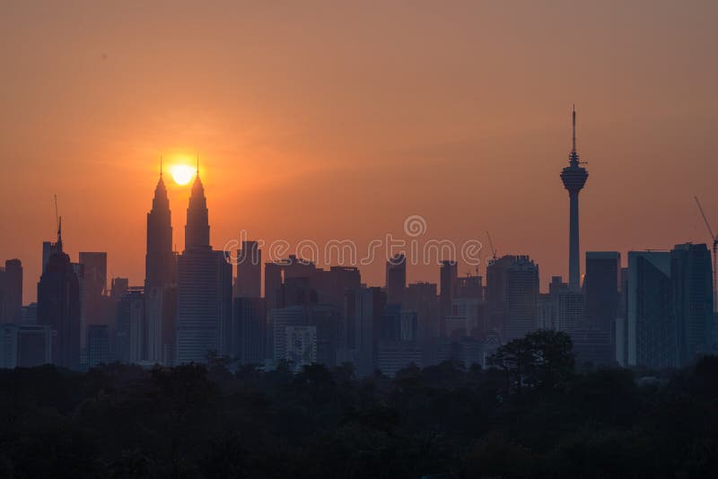 Sunrise at KLCC Lake stock photo. Image of morning, east - 52623538