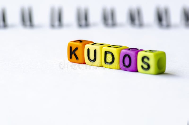 KUDOS Text on Colorful Plastic Alphabet Beads Stock Image - Image of ...