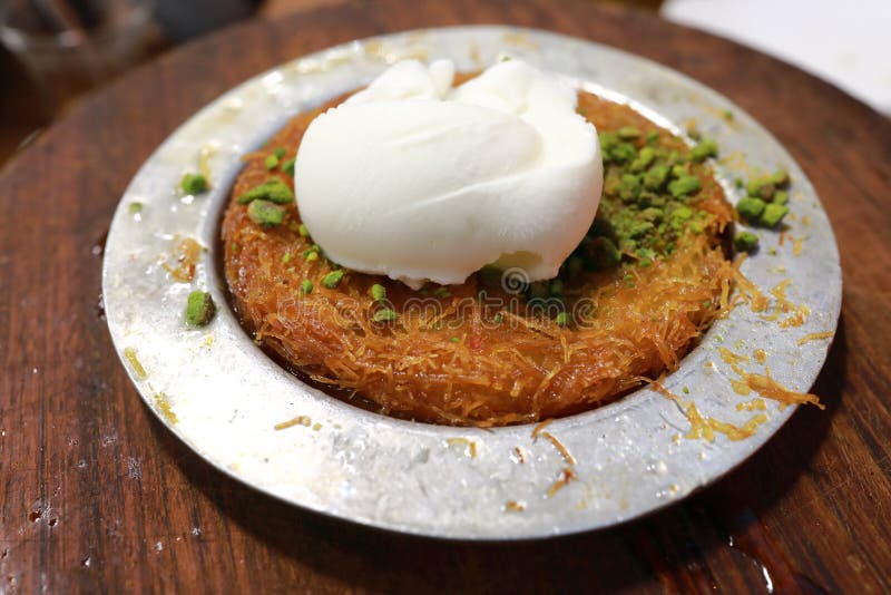 Kunefe with ice cream stock photo. Image of pastry, cake - 200156492