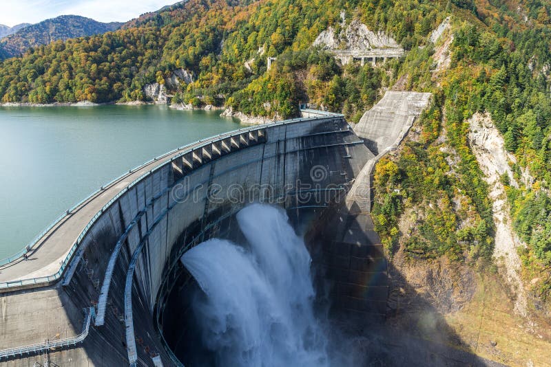 Kurobe Dam and rainbow stock photo. Image of rainbow - 91899270