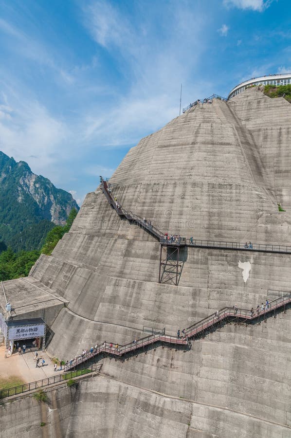 Kurobe Dam with Rainbow editorial photography. Image of foliage - 83484032