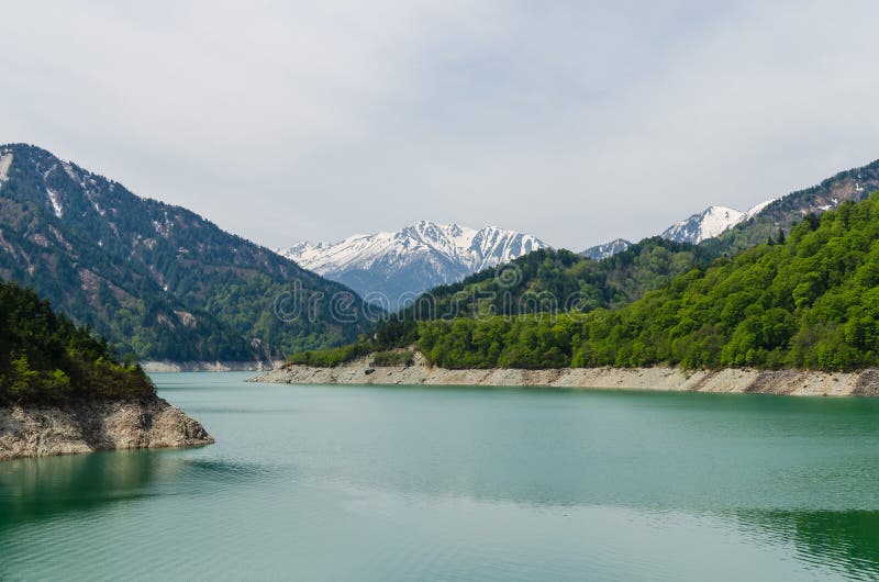 Kurobe Dam at Tateyama Kurobe Alpine Route Japan Stock Image - Image of ...