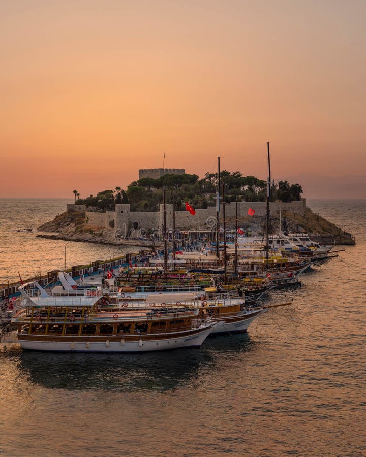Kusadasi, Turkey - August 23, 2021: Pigeon Island Castle, Guvercinada ... Kusadasi, Turkey - August 23, 2021: Pigeon Island Castle, Guvercinada ...
