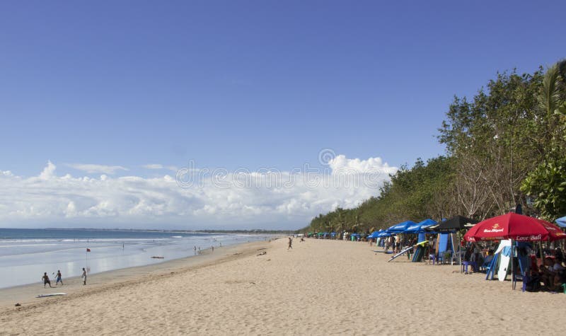 Kuta beach Bali, Indonesia editorial stock image. Image of parasols ...