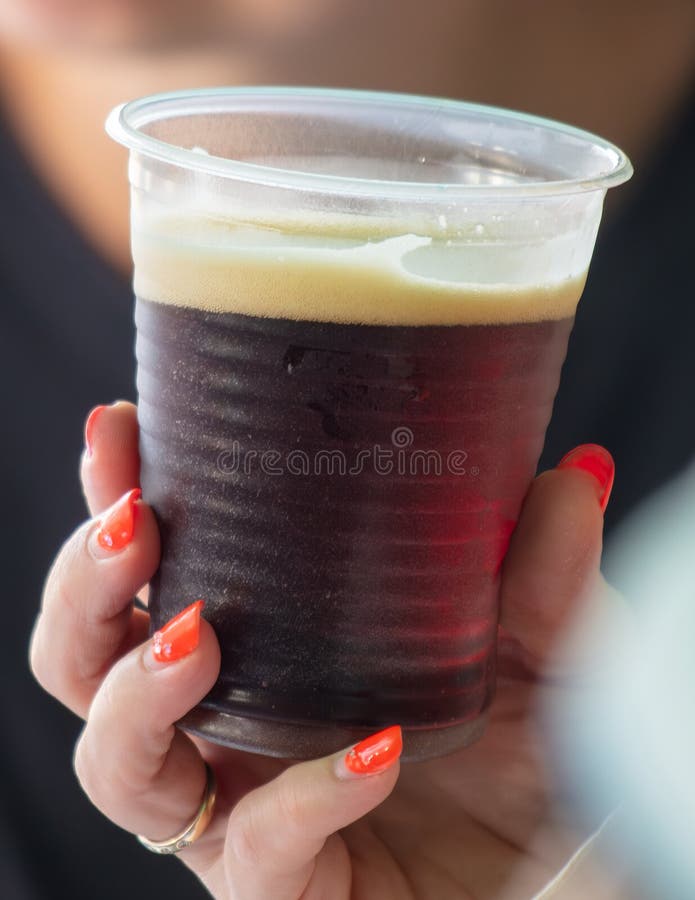 Kvass in a Plastic Glass in the Hands of a Woman Stock Photo - Image of ...