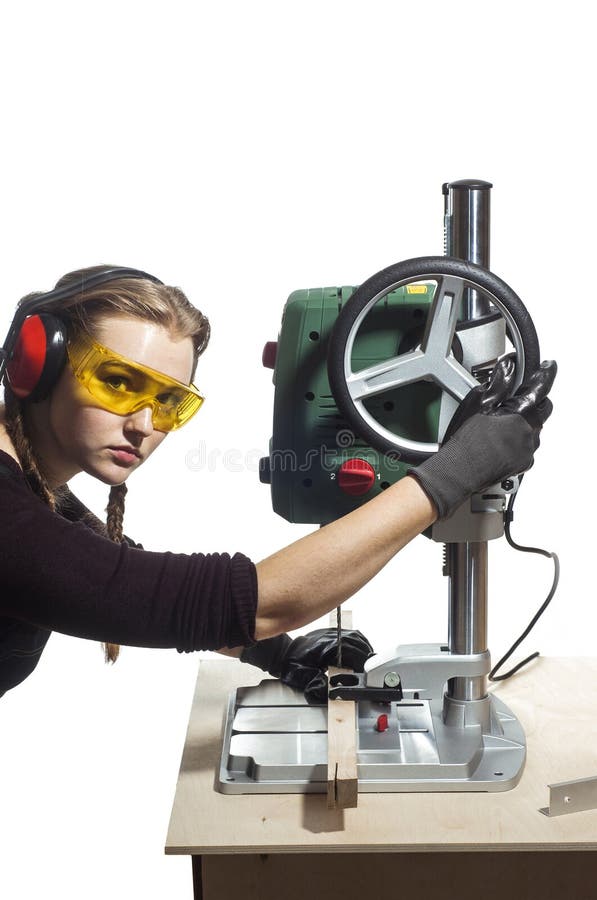 Kvinnlig Snickare Och Borrandemaskin Arkivfoto - Bild av skyddande ...