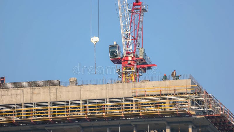 Building Construction with Scafolding and Red Crane. Editorial ...