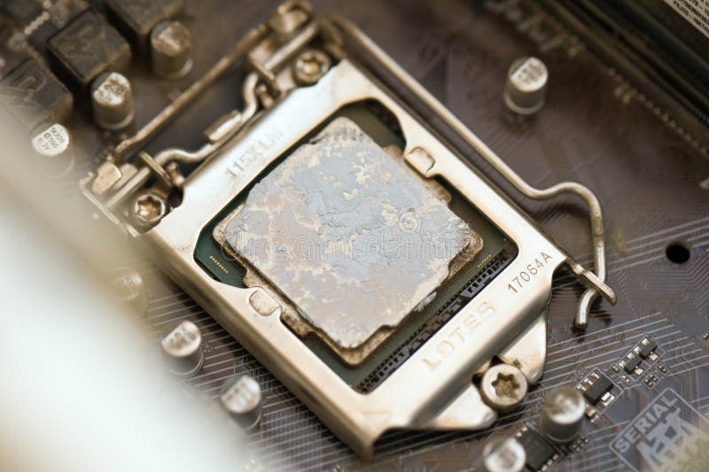 KYIV, UKRAINE - JANUARY 29, 2025 Close Up Old Thermal Paste on the CPU ...
