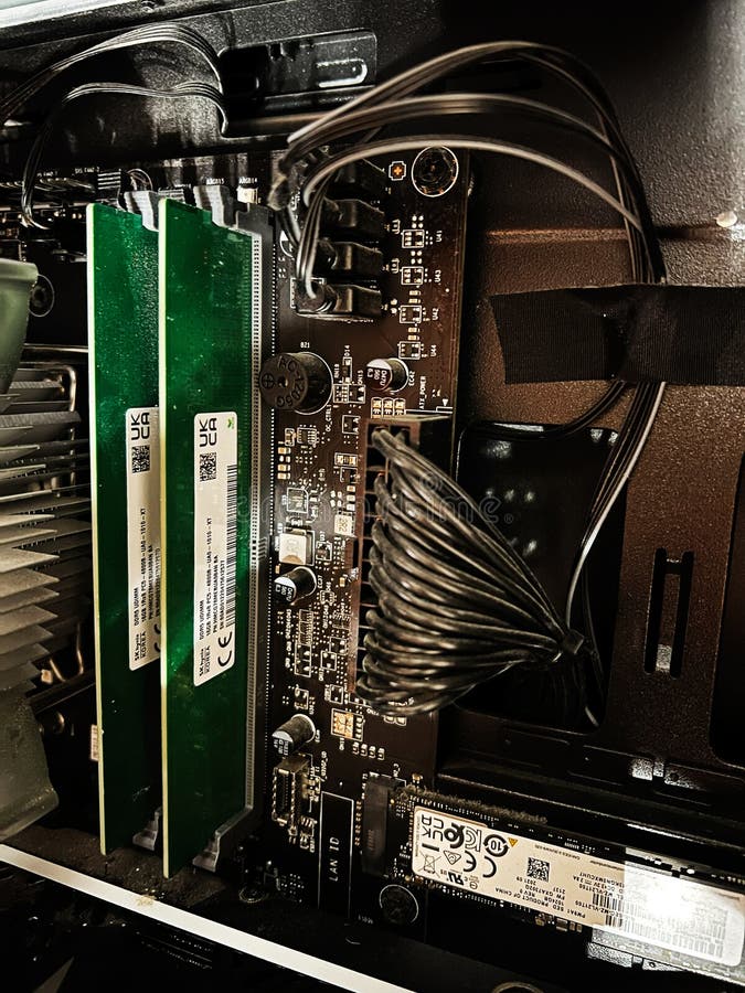 Close-up View of Computer Components Including RAM Modules and an M.2 ...