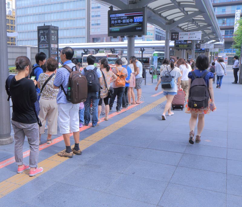 People Waiting For The Bus In Kyoto, Japan Editorial Photo - Image of ...