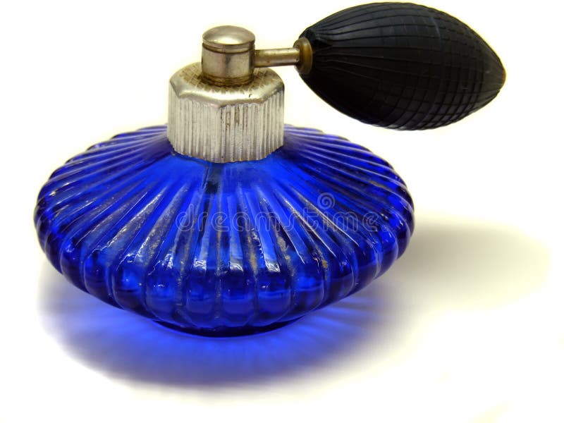 La Botella Azul Con Perfume Imagen de archivo - Imagen de cristal ...