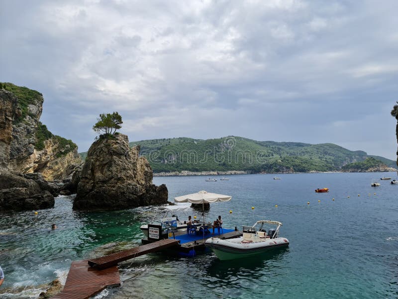 La Grotta Bar in Corfu, Greece Stock Image - Image of coast, cove ...