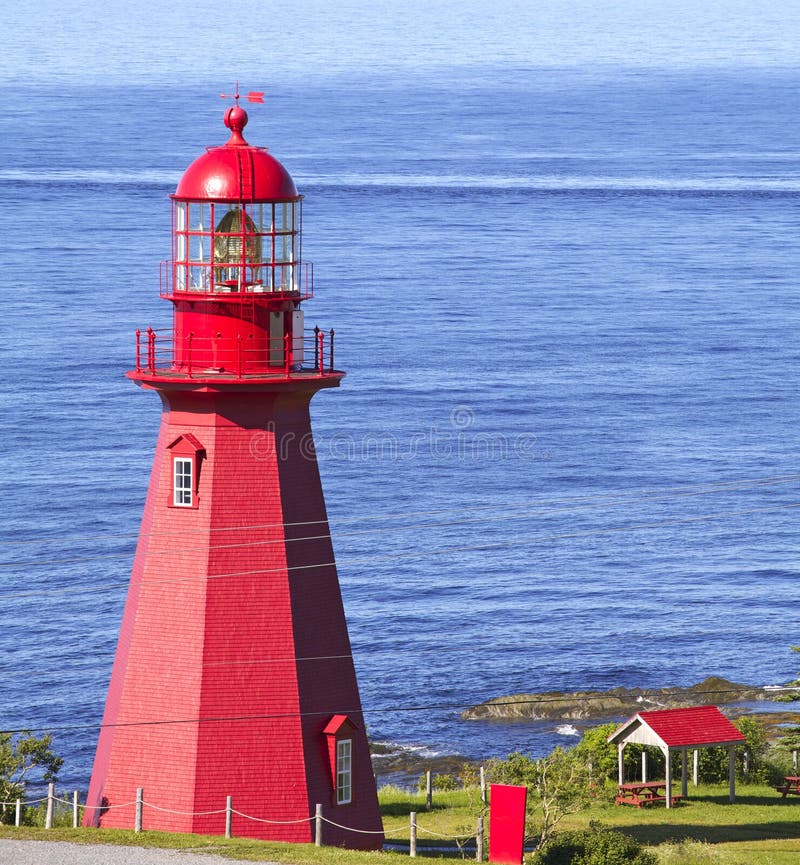 La Martre Lighthouse and Church, Quebec Stock Photo - Image of canada ...