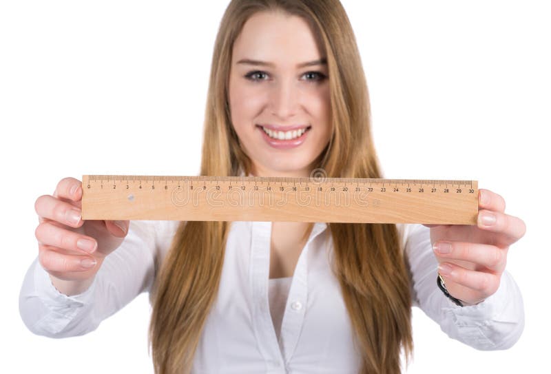 La Mujer Joven Muestra Una Regla Imagen de archivo - Imagen de oficina ...