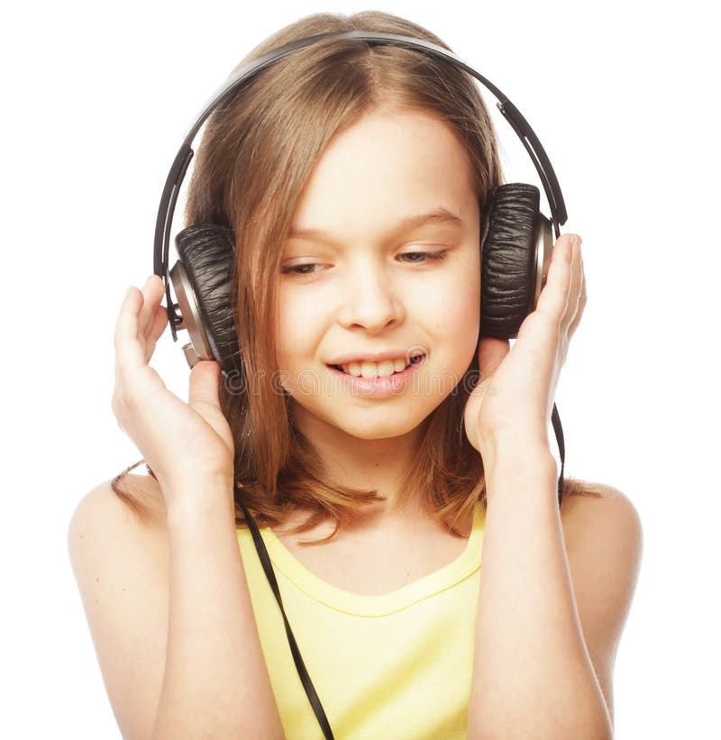 La Ragazza Sta Tenendo Le Cuffie Fotografia Stock - Immagine di testa ...