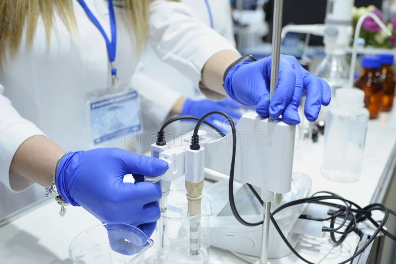 Lab Assistant Hands in Blue Gloves Adjusting Ionometer To Measure PH ...