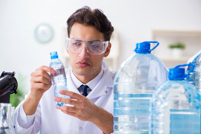 The Lab Assistant Testing Water Quality Stock Photo - Image of chemist ...