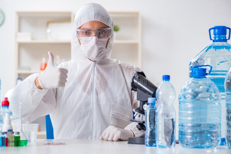 Lab Assistant Testing Water Quality Stock Photo - Image of chemist ...