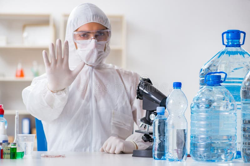 Lab Assistant Testing Water Quality Stock Photo - Image of chemist ...