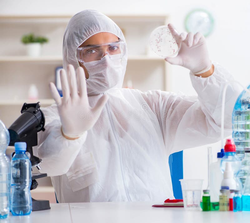 Lab Assistant Testing Water Quality Stock Image - Image of chemist ...