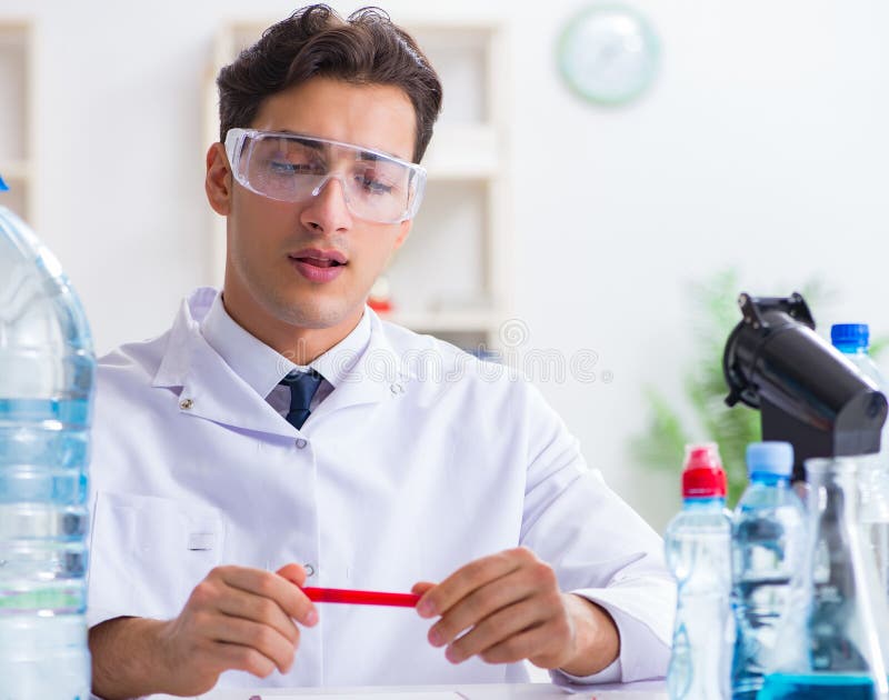 Lab Assistant Testing Water Quality Stock Image - Image of experiment ...