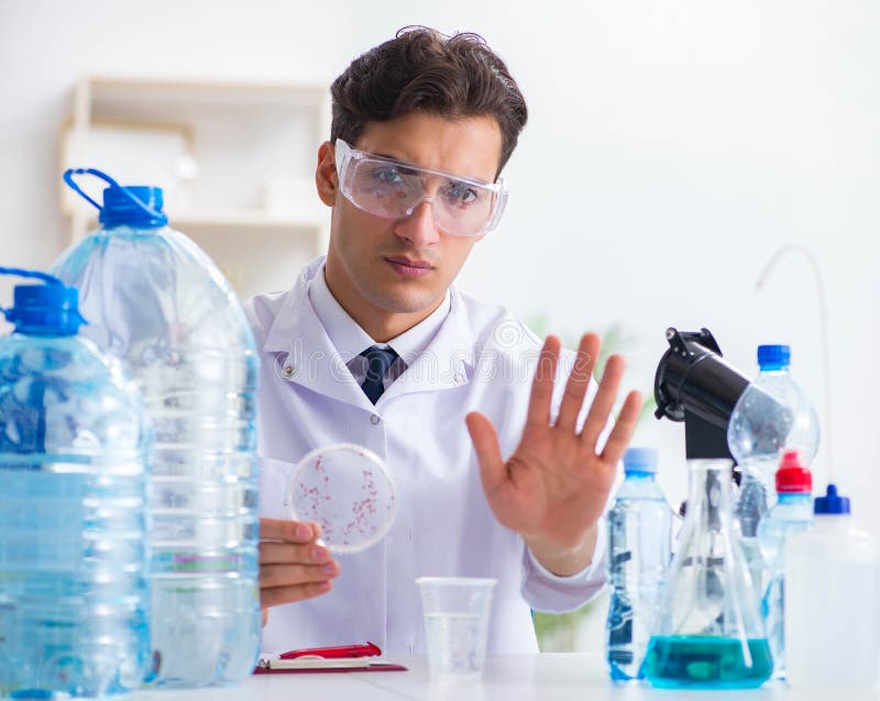 Lab Assistant Testing Water Quality Stock Photo - Image of chemist ...