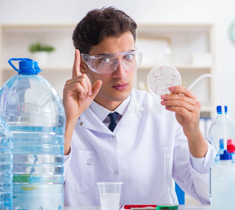 Lab Assistant Testing Water Quality Stock Photo - Image of exclamation ...