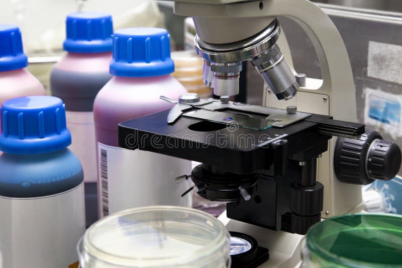 Lab Bench with Microscopic Analysis with Samples and Reagents Stock ...
