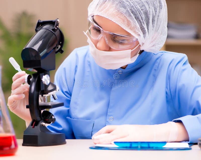 Lab Chemist Working with Microscope and Tubes Stock Image - Image of ...