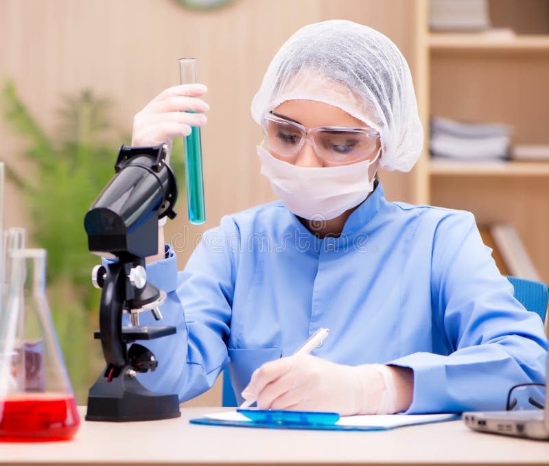 Lab Chemist Working with Microscope and Tubes Stock Photo - Image of ...