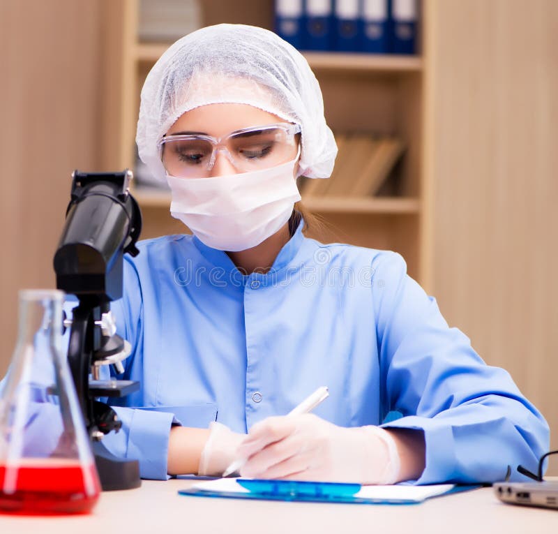 Lab Chemist Working with Microscope and Tubes Stock Photo - Image of ...