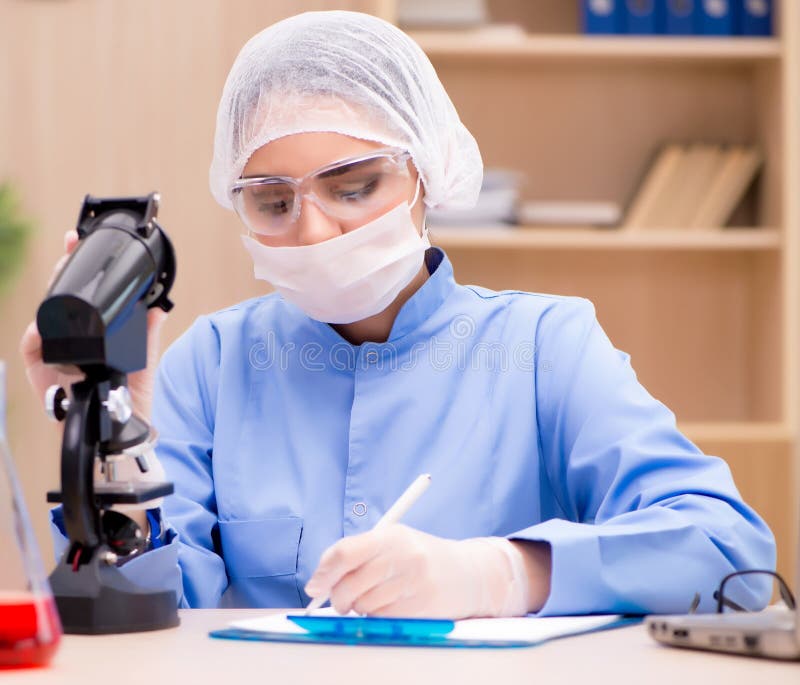 Lab Chemist Working with Microscope and Tubes Stock Photo - Image of ...